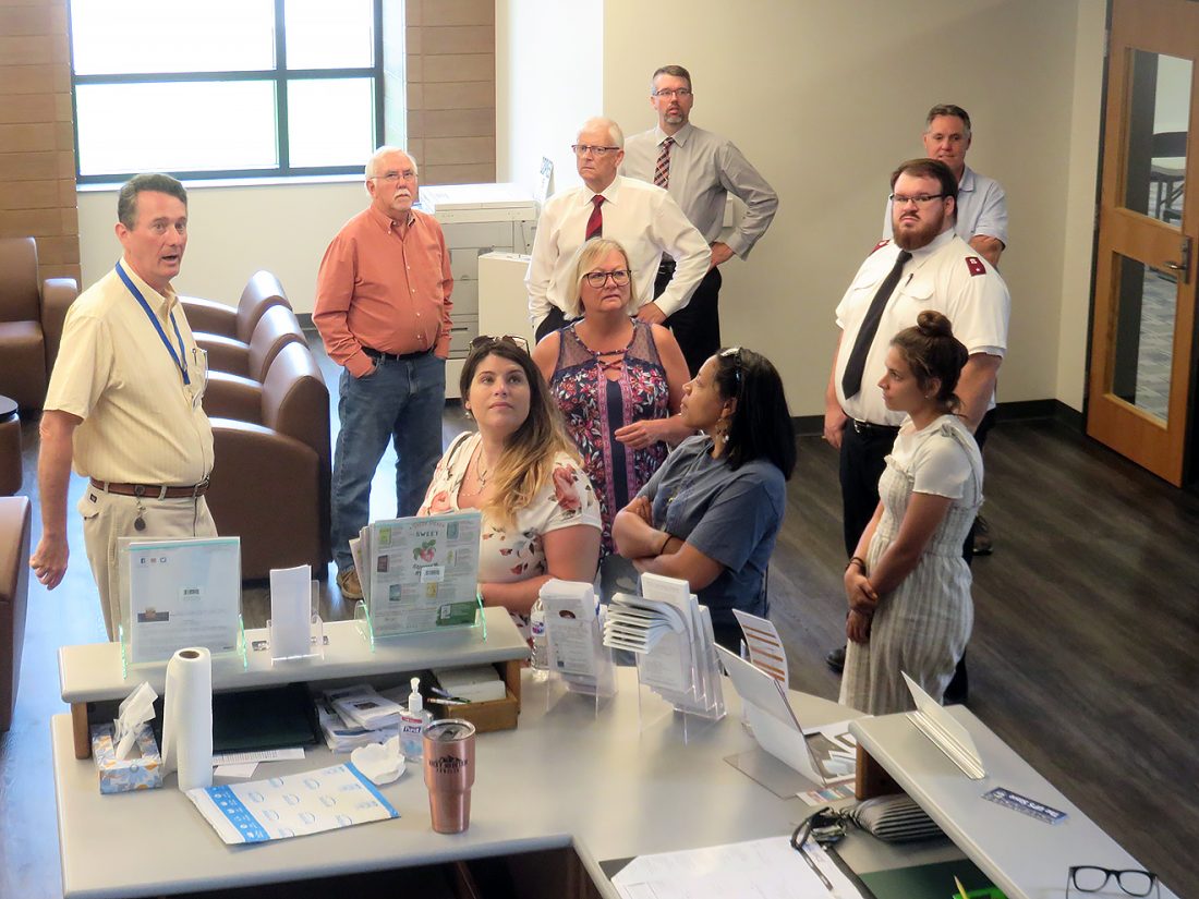 Kiwanians tour library | News, Sports, Jobs - The Herald Star